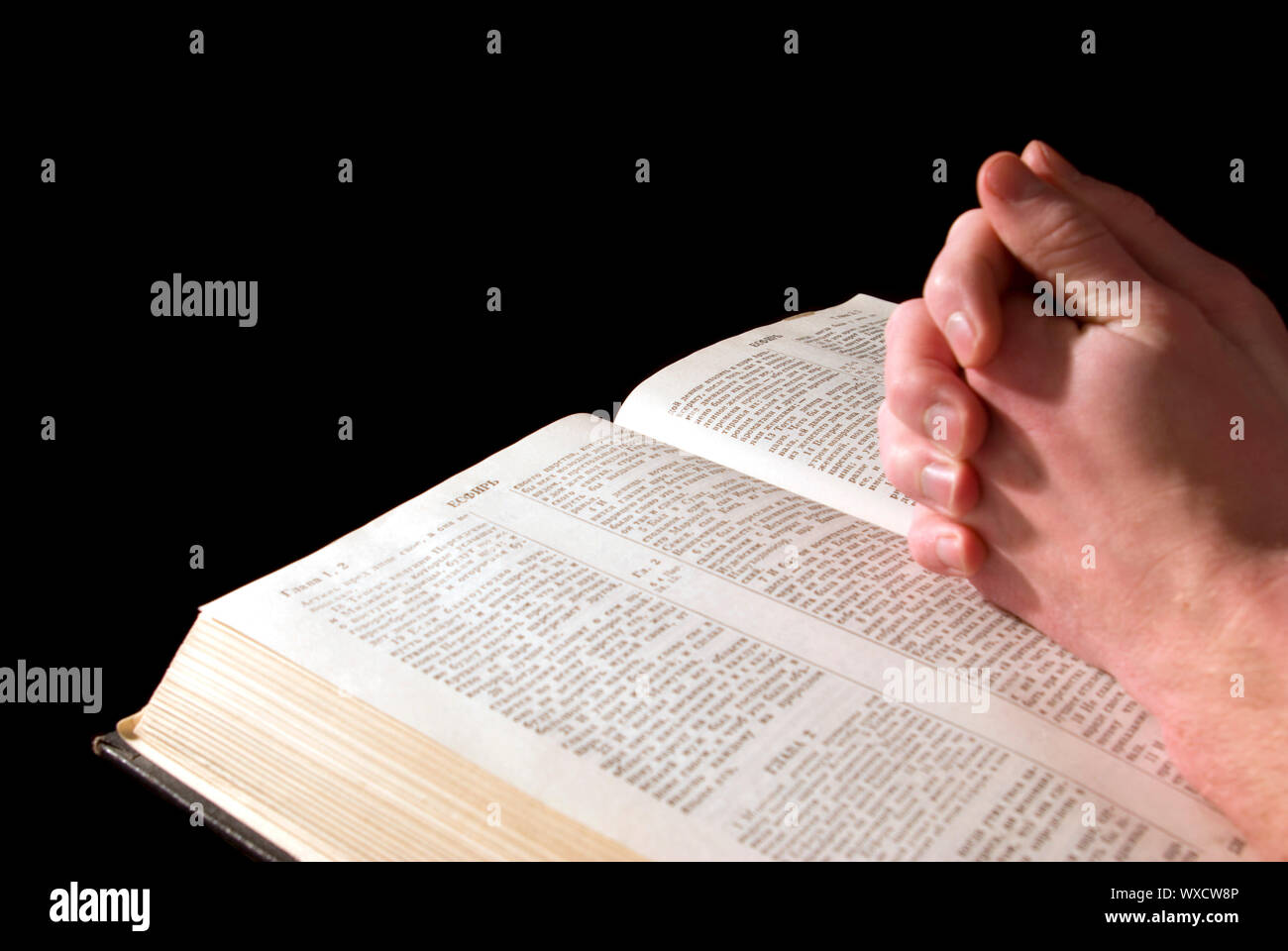 Mans hands over bible hi-res stock photography and images - Alamy