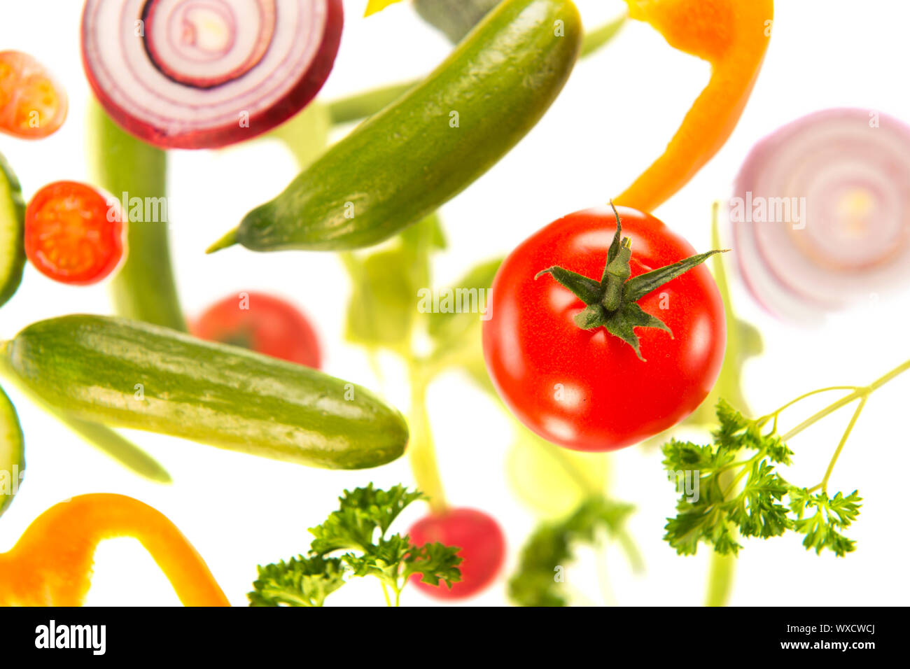 Floating mixed vegetables on white background Stock Photo - Alamy