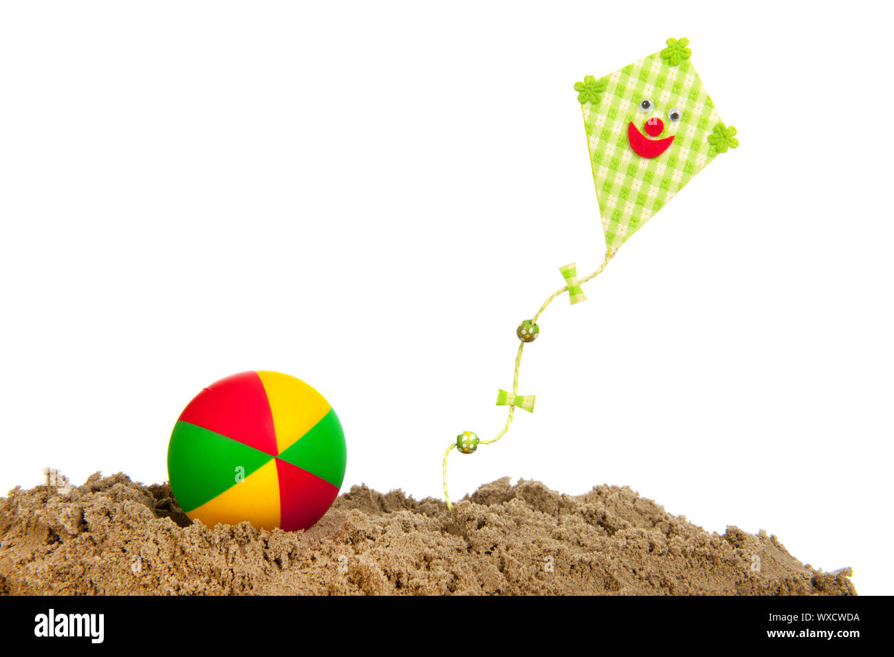 kite and colorful ball at the beach in the studio Stock Photo - Alamy