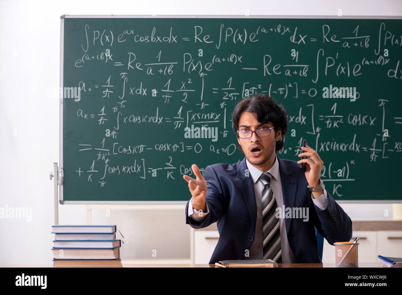 Male science teacher talking hi-res stock photography and images - Alamy