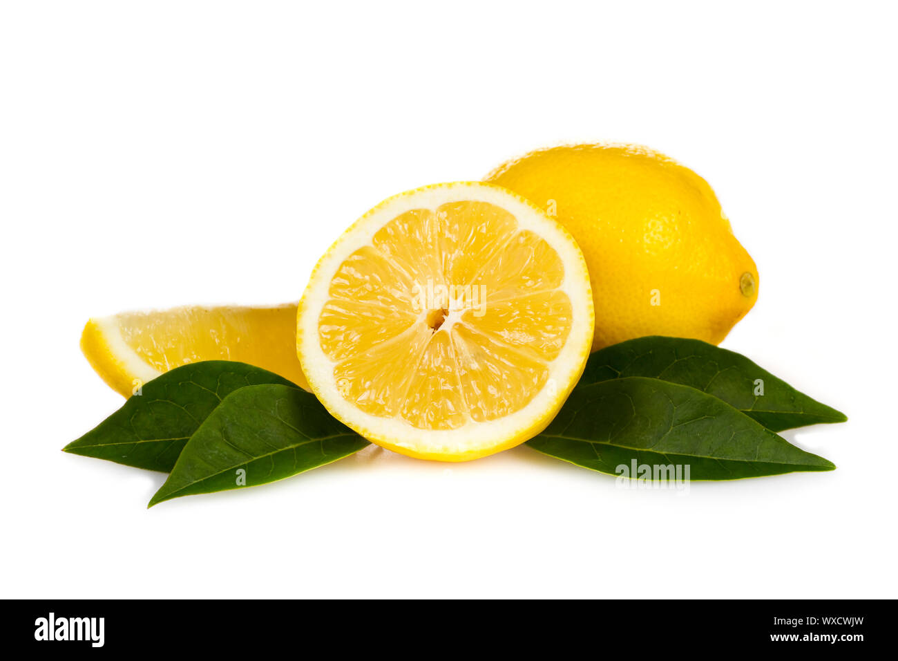 Fresh lemon fruits with leaves over white background Stock Photo - Alamy