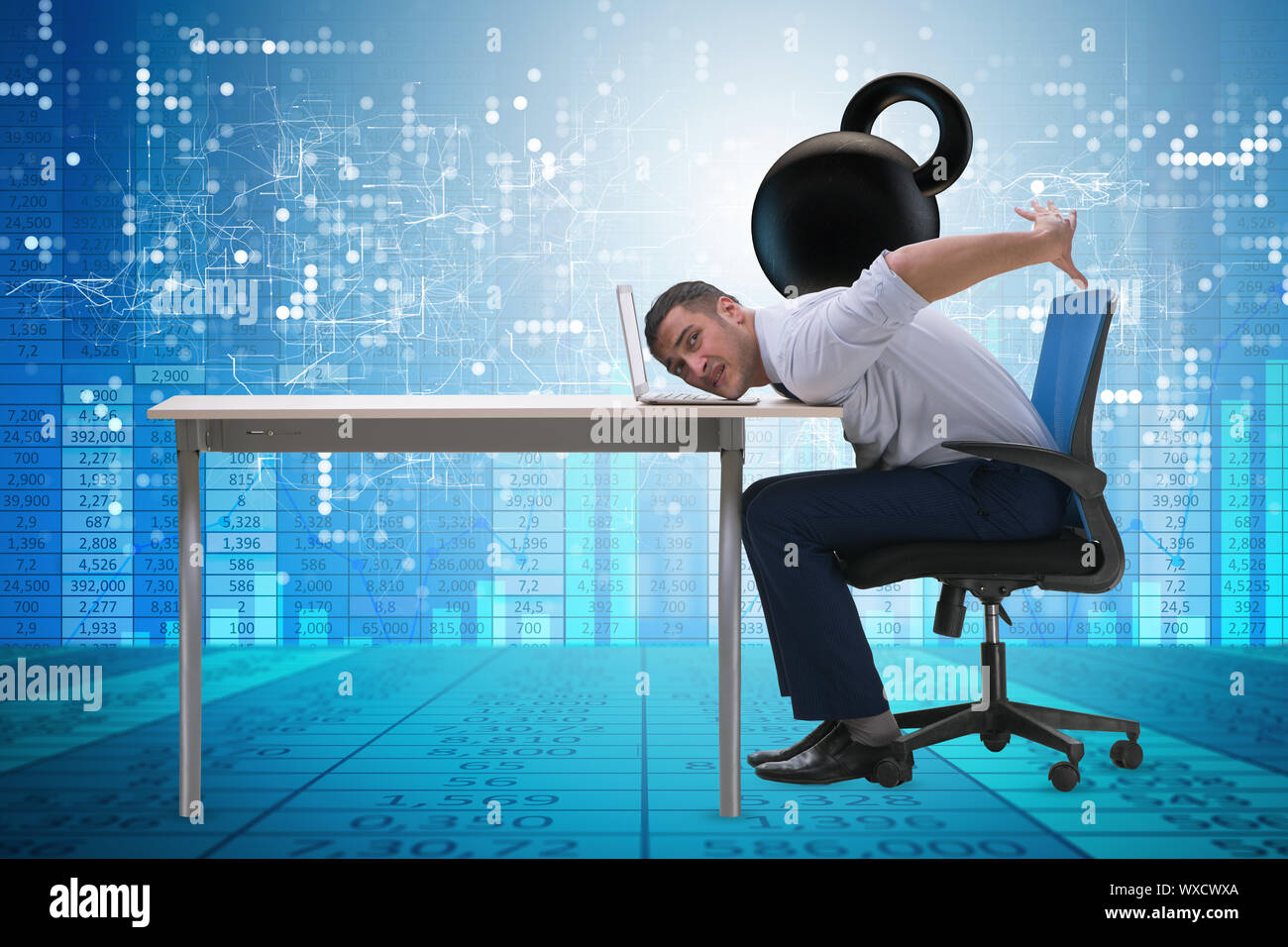 Employee with burden of work Stock Photo - Alamy