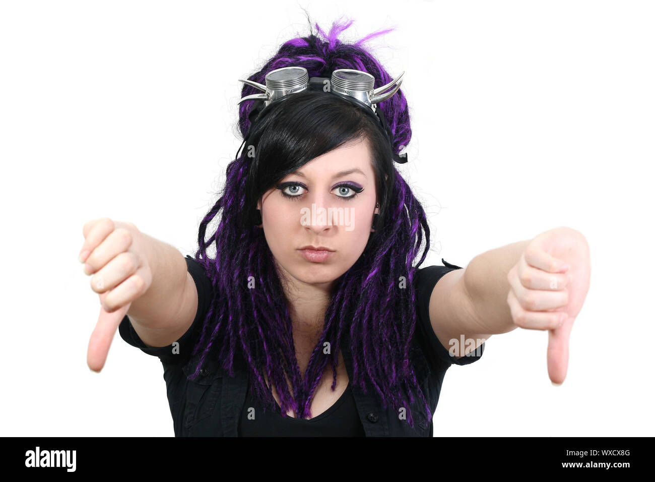 Gothic girl with cyberlox and cyber goggle showing the thumb down ...