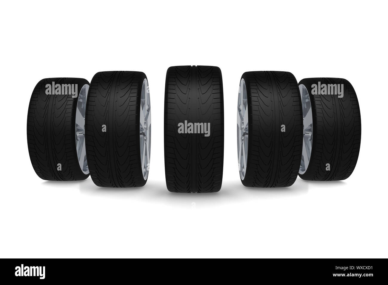 Perspective view of five new car wheels isolated on the white ...