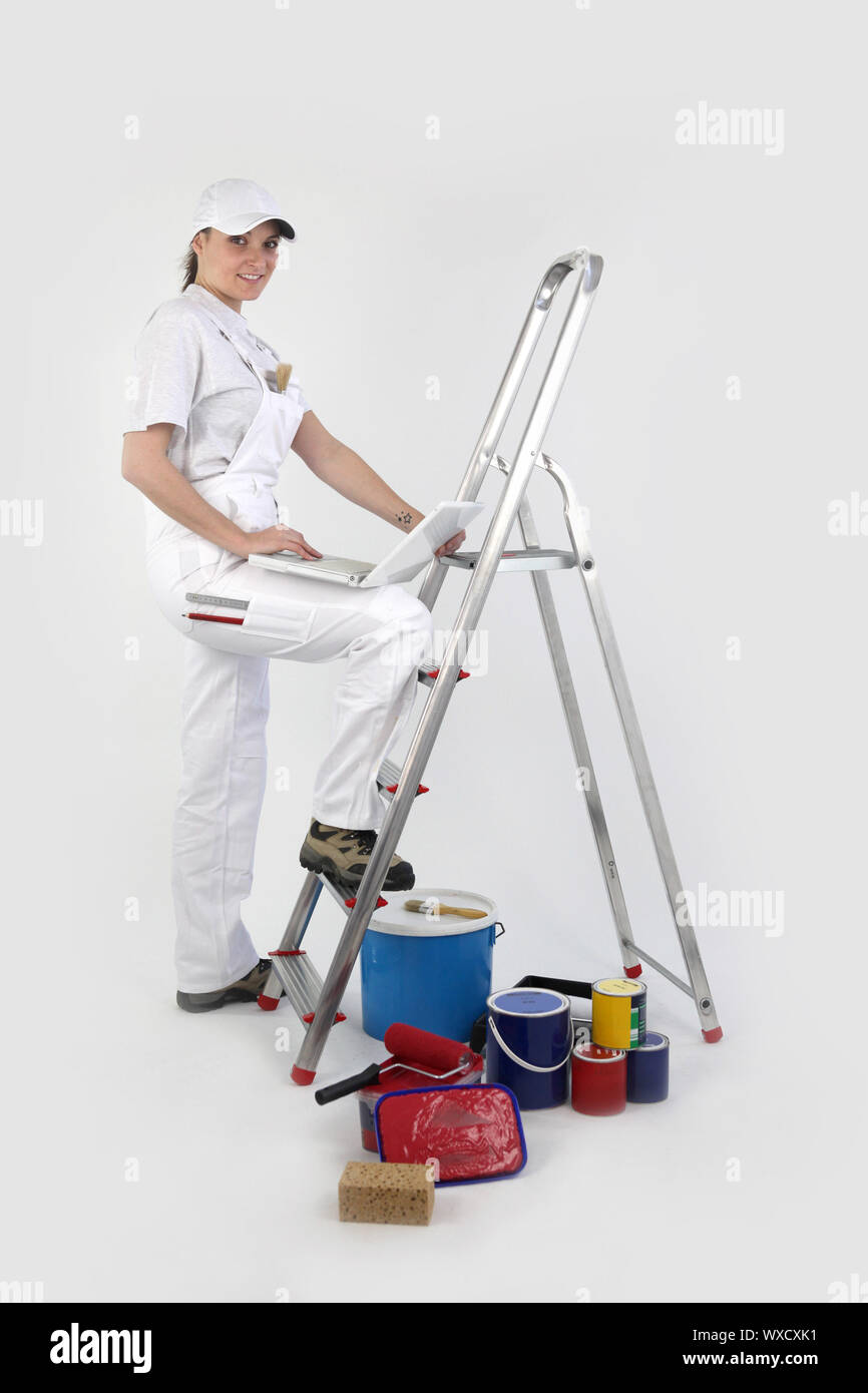 female painter on a ladder Stock Photo - Alamy