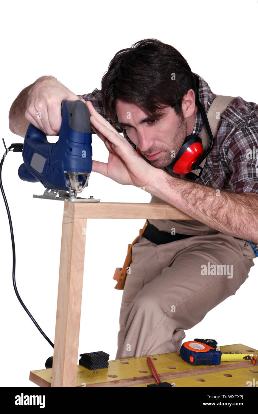 craftsman working with a drill Stock Photo - Alamy