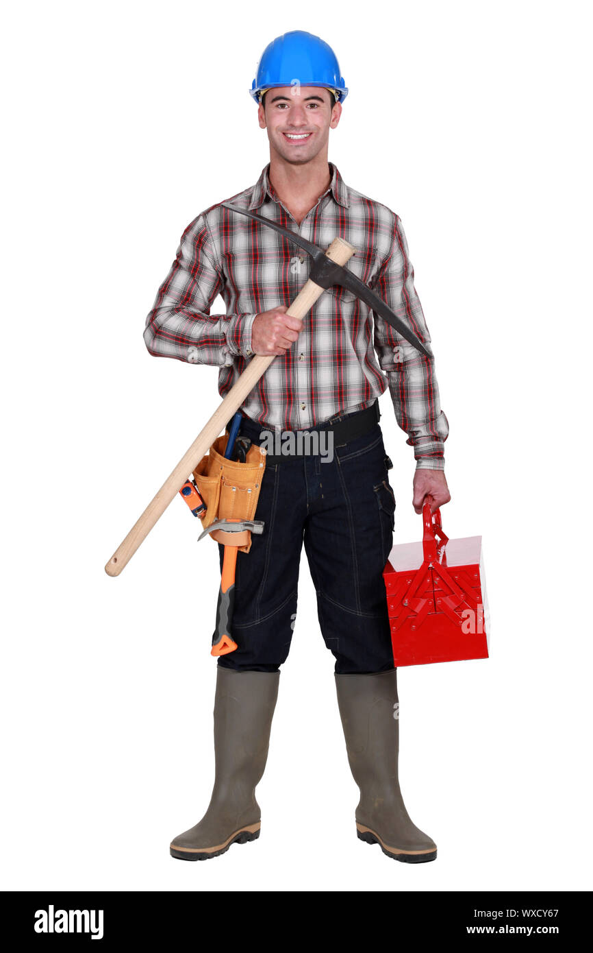 craftsman holding a pick Stock Photo - Alamy