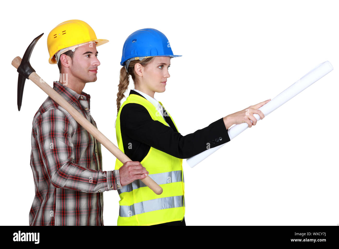 Construction worker standing next to a civil engineer Stock Photo - Alamy