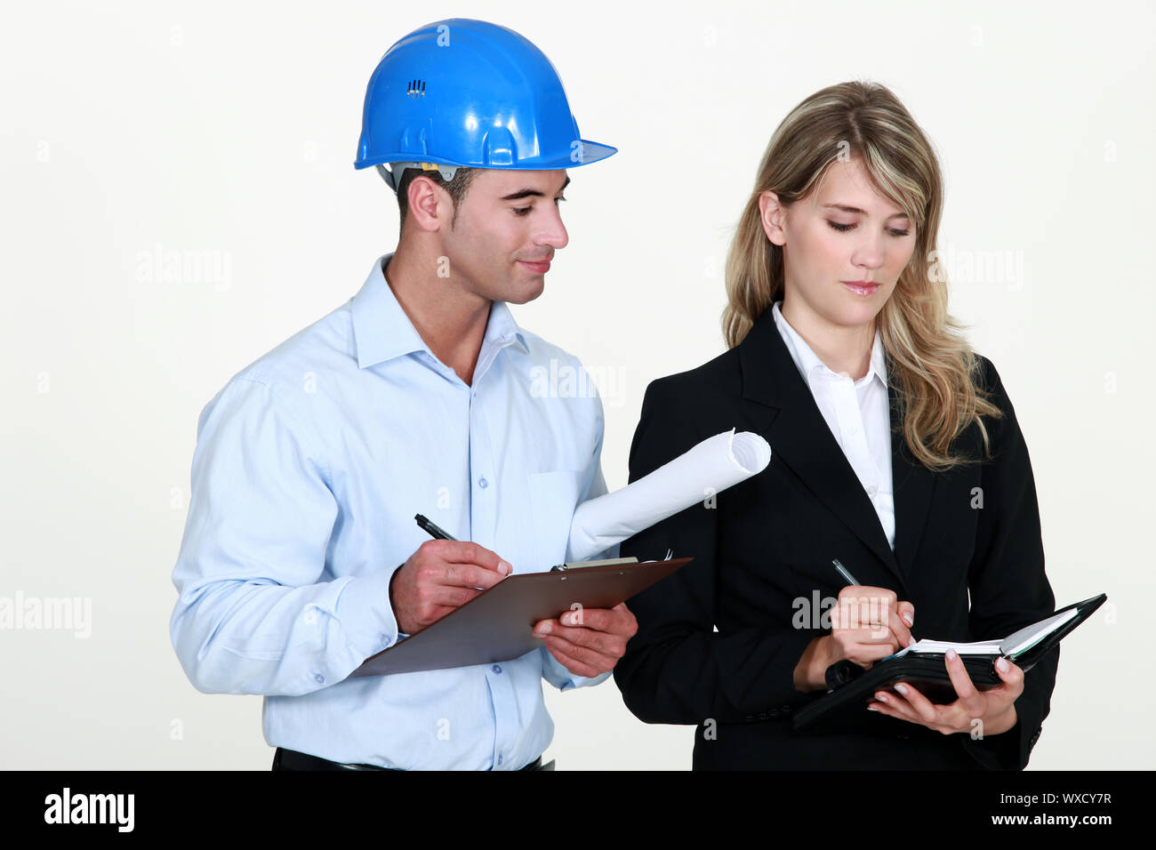 Architects taking notes Stock Photo - Alamy