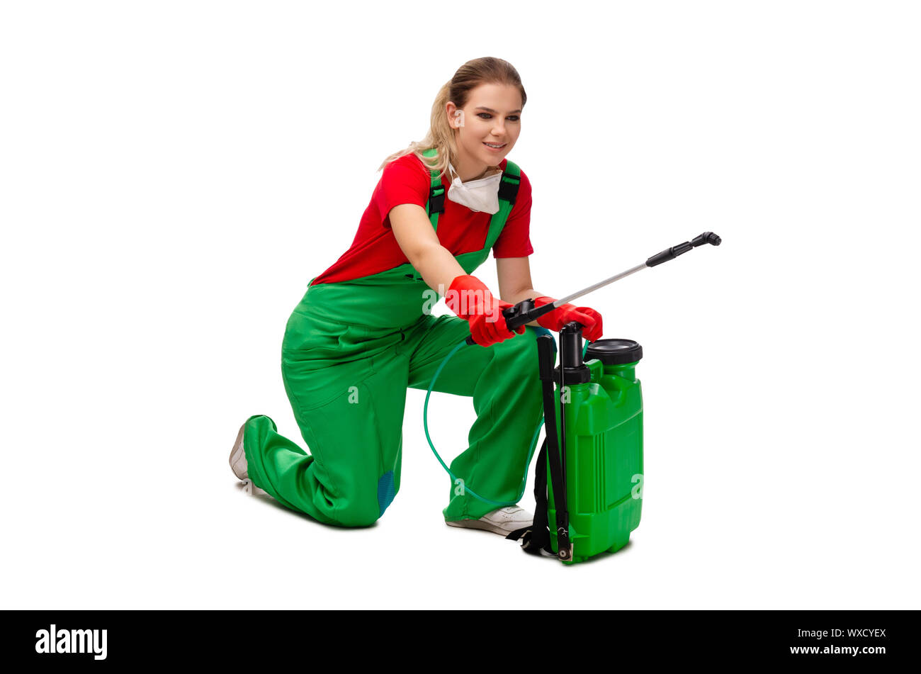 Female pest control contractor isolated on white Stock Photo - Alamy