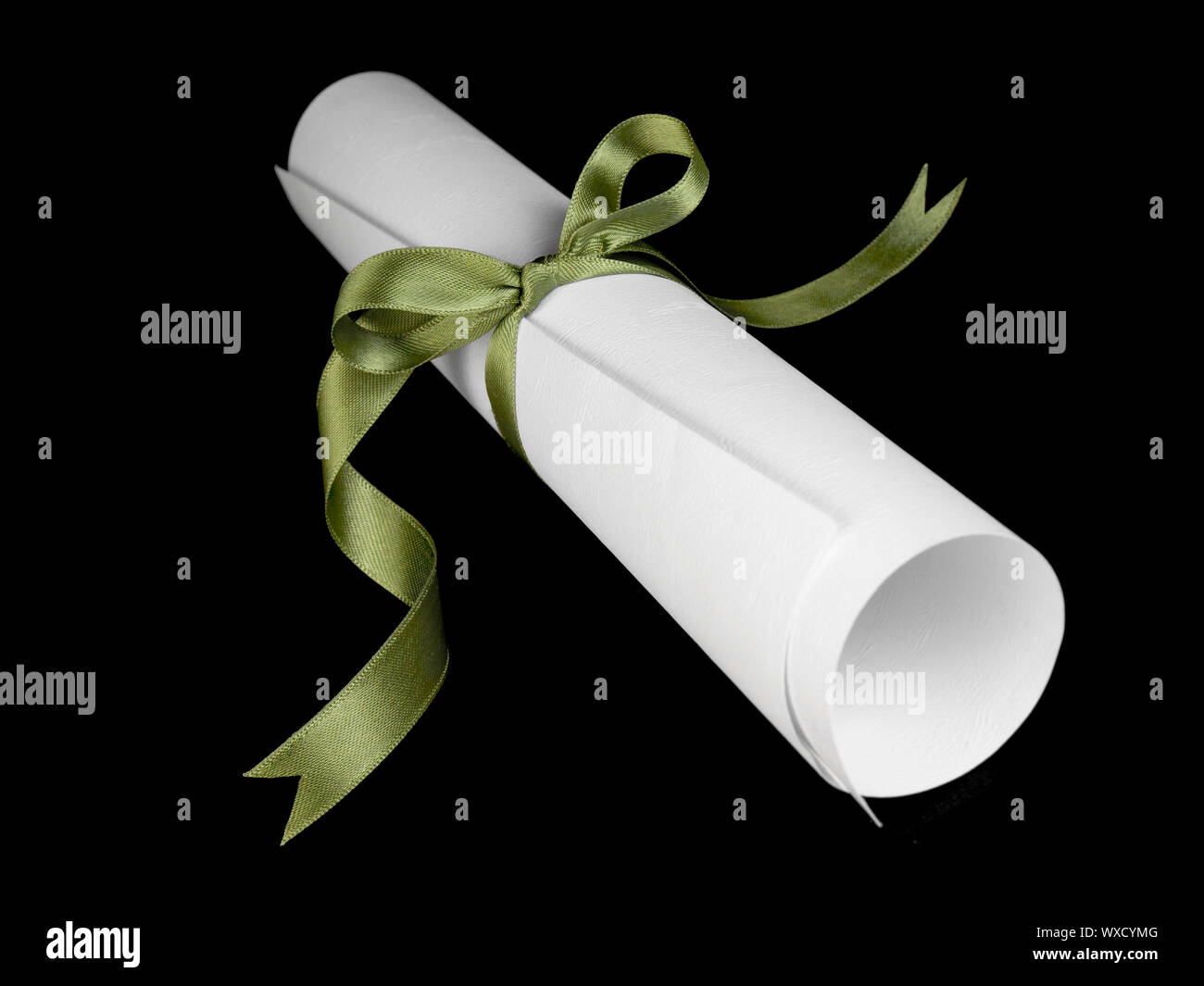 Diploma with a green silk ribbon, isolated on black background Stock ...