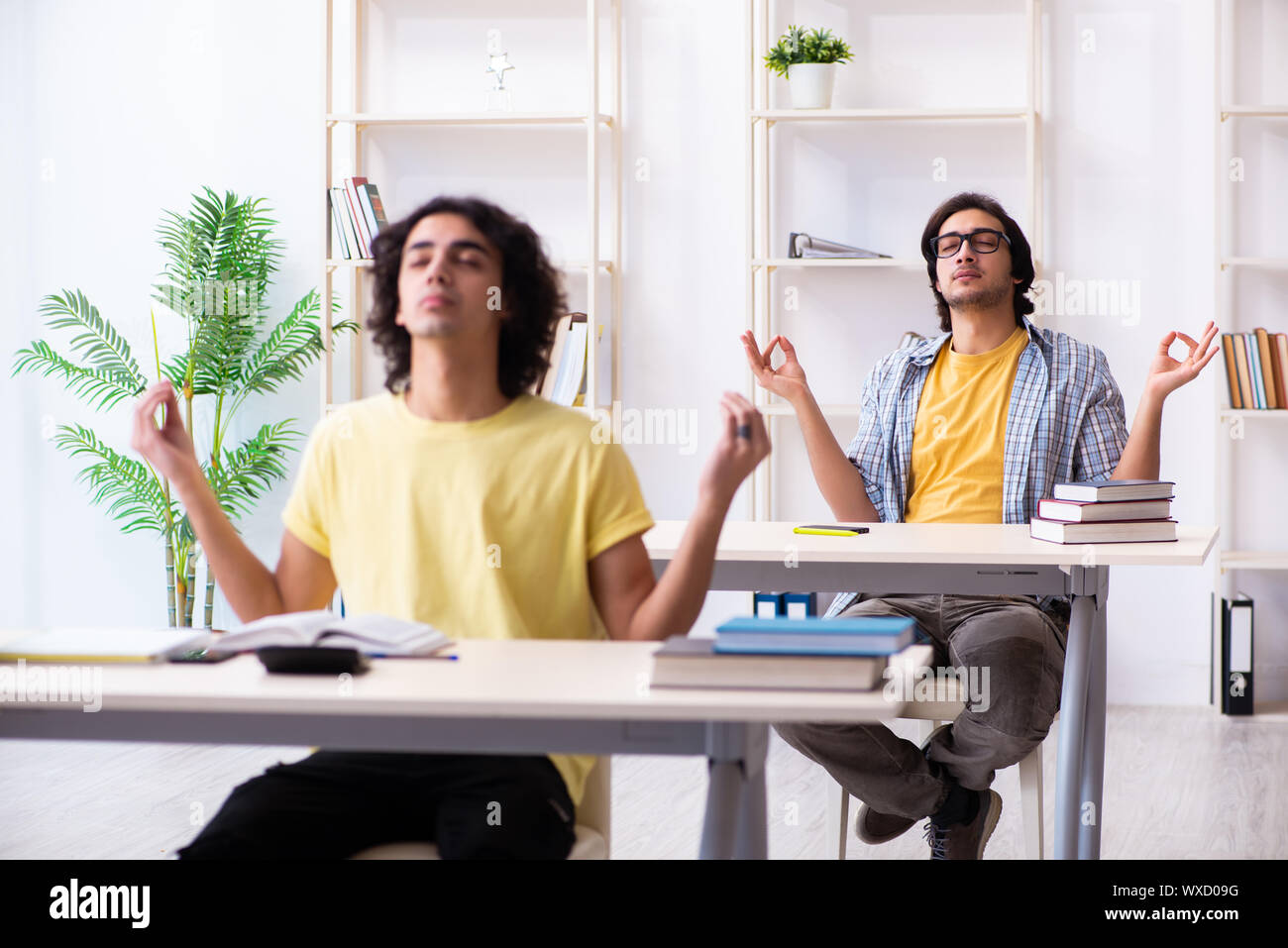 Two male students in the classroom Stock Photo - Alamy