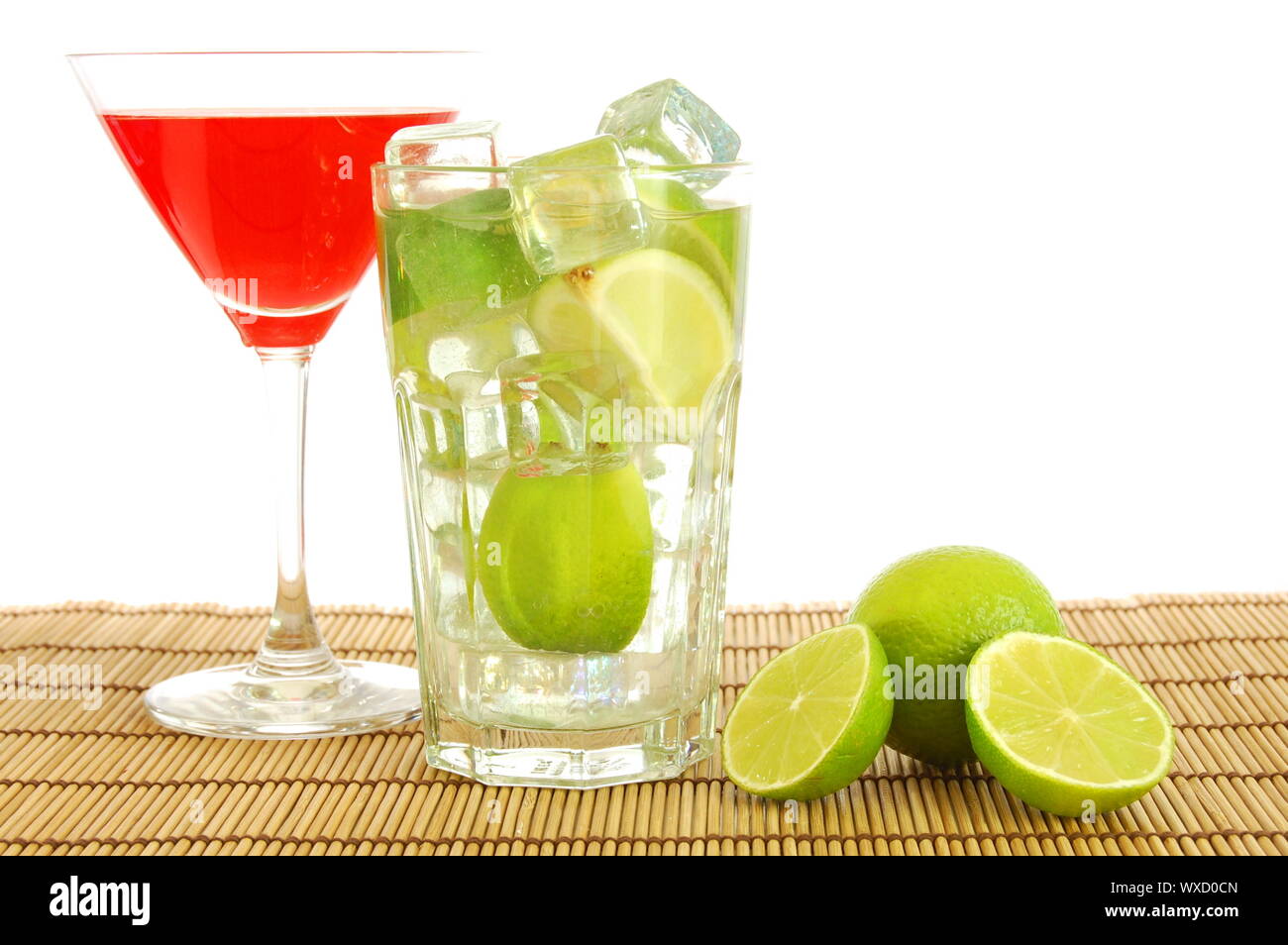green and red cocktail with lime and copyspace Stock Photo - Alamy