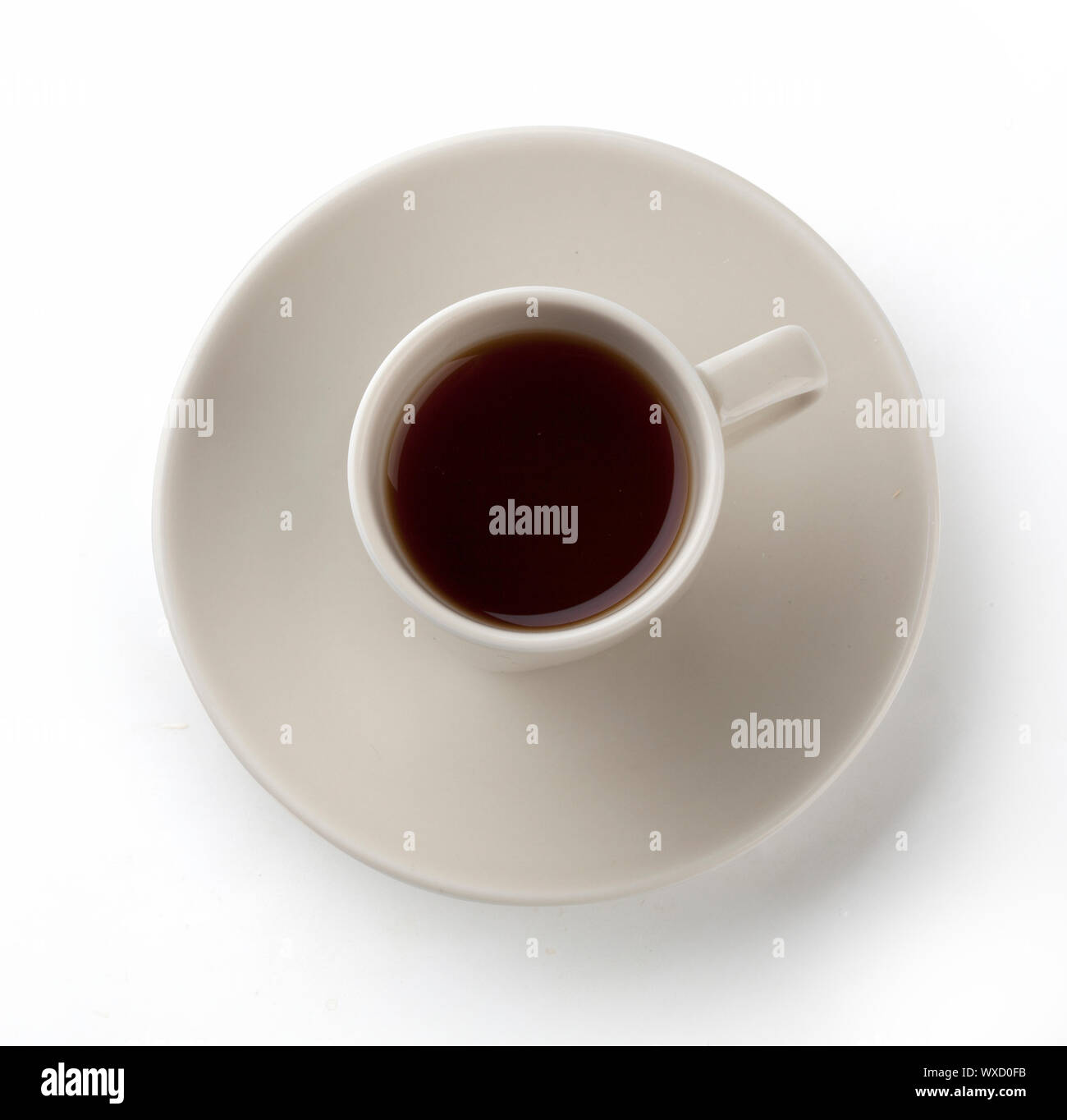 Isolated beige cup of coffee on the saucer Stock Photo - Alamy
