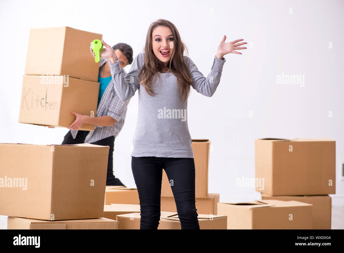Young pair moving to new flat Stock Photo - Alamy