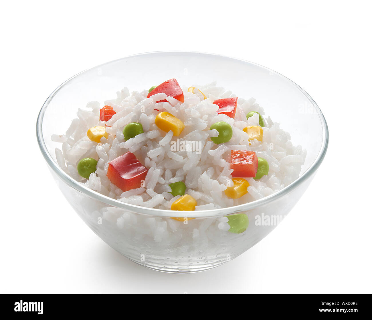 Vegetable mix with rice, peas, corn and paprika in the glass bowl Stock ...