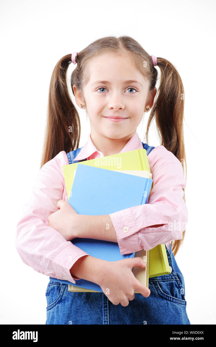 Beautiful little girl student hold textbooks Stock Photo - Alamy