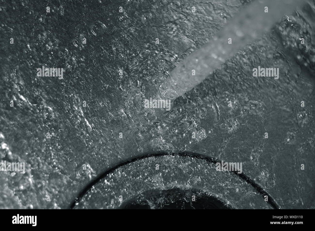 water flow into the drain in the kitchen Stock Photo - Alamy