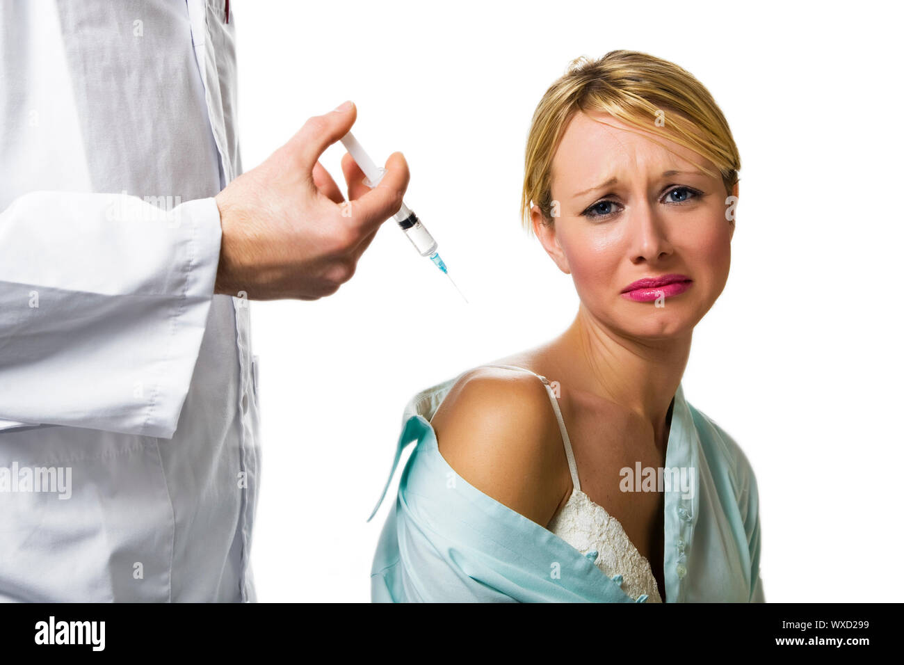 healthcare and medicine: young woman scared of injections Stock Photo ...