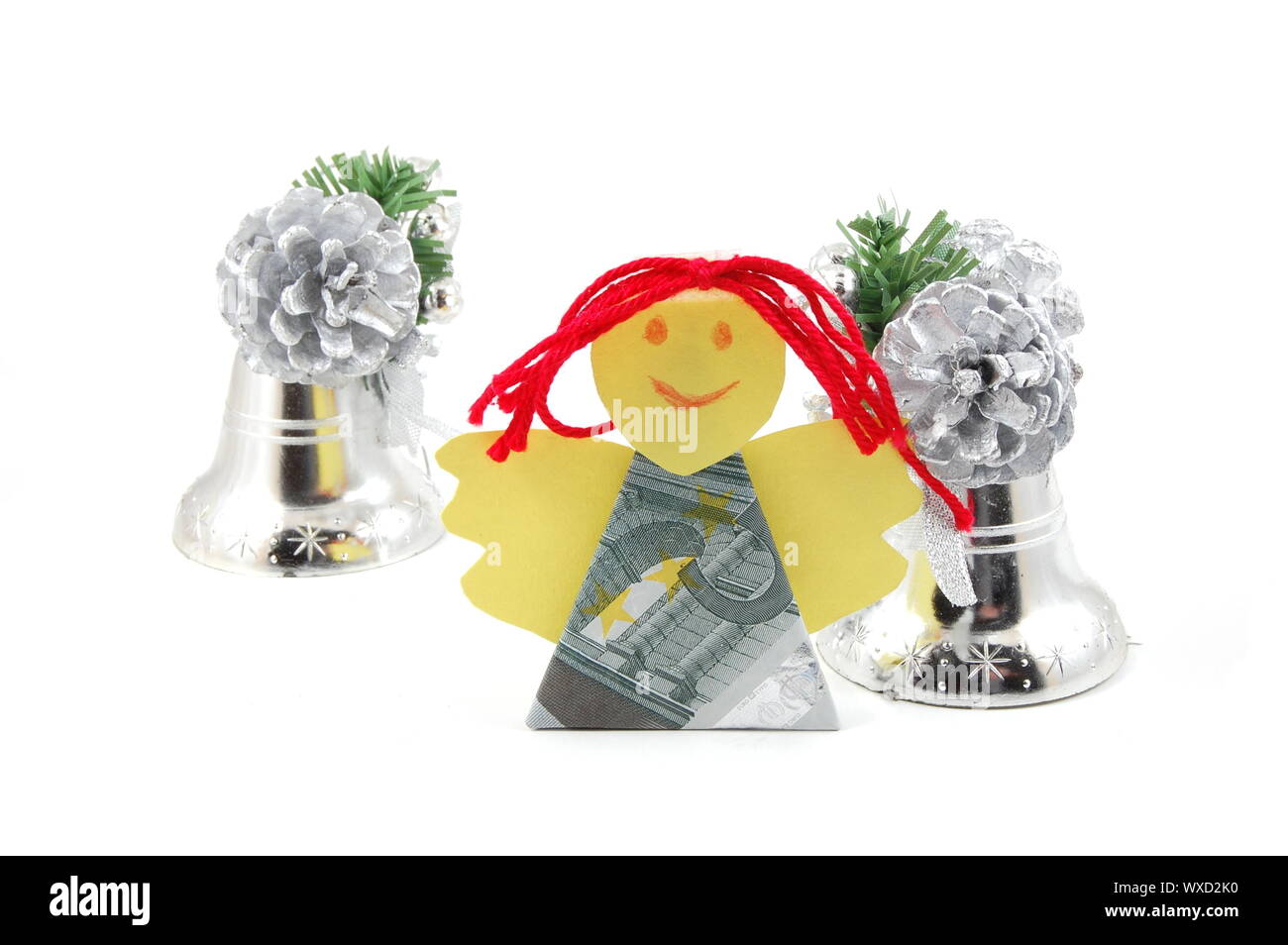 Angel made of money isolated on white background Stock Photo - Alamy