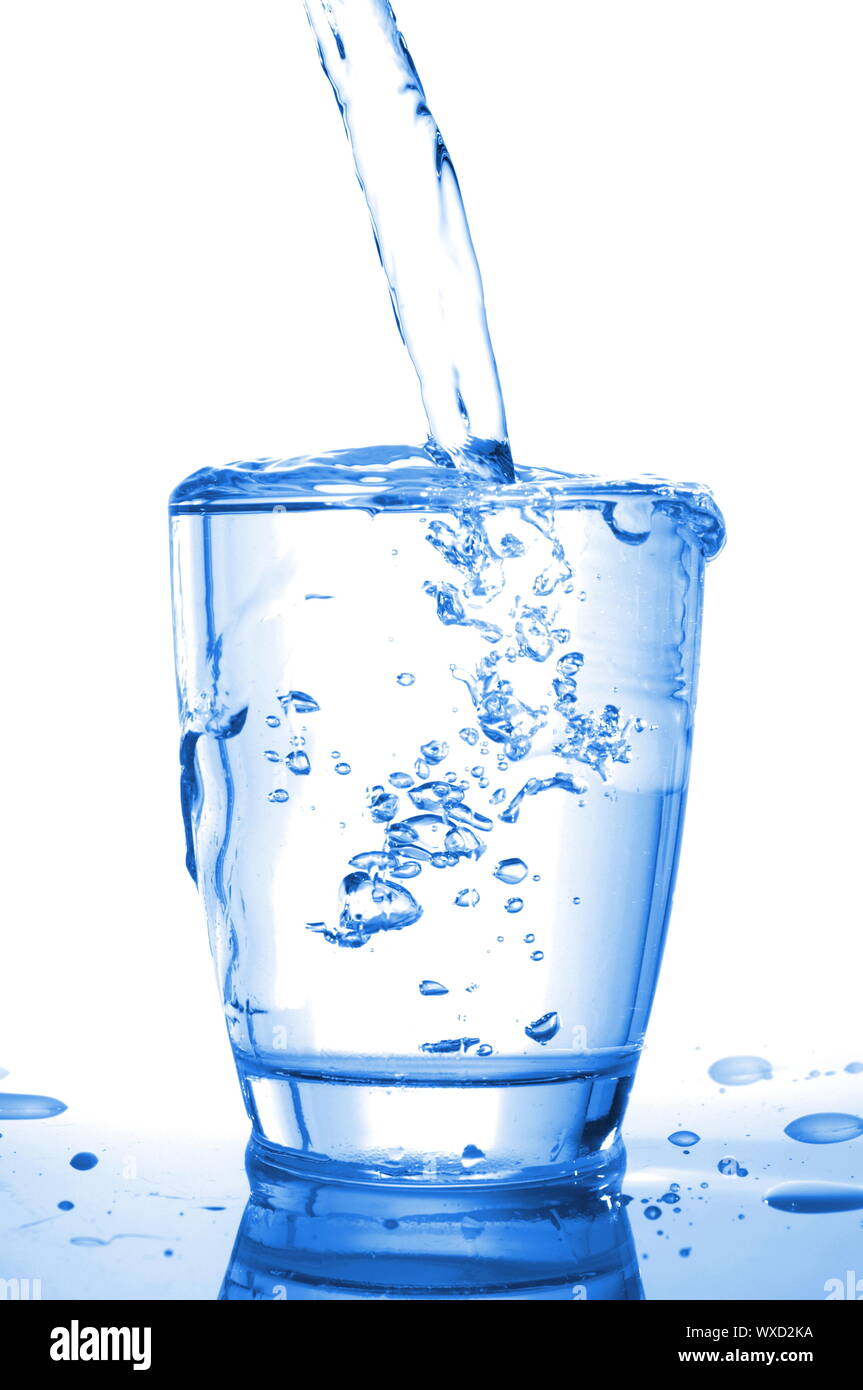 lifestyle concept with glass of pouring cold water Stock Photo - Alamy