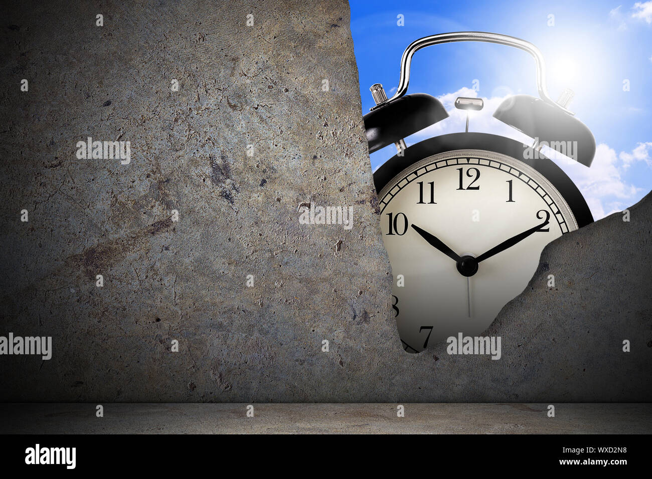 Time management concept, business planning; alarm clock behind crack ...