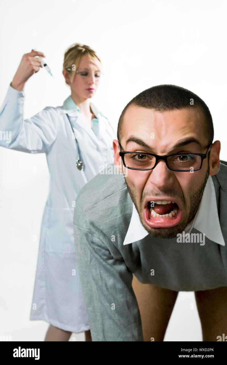 healthcare and medicine: young man scared of injections Stock Photo - Alamy
