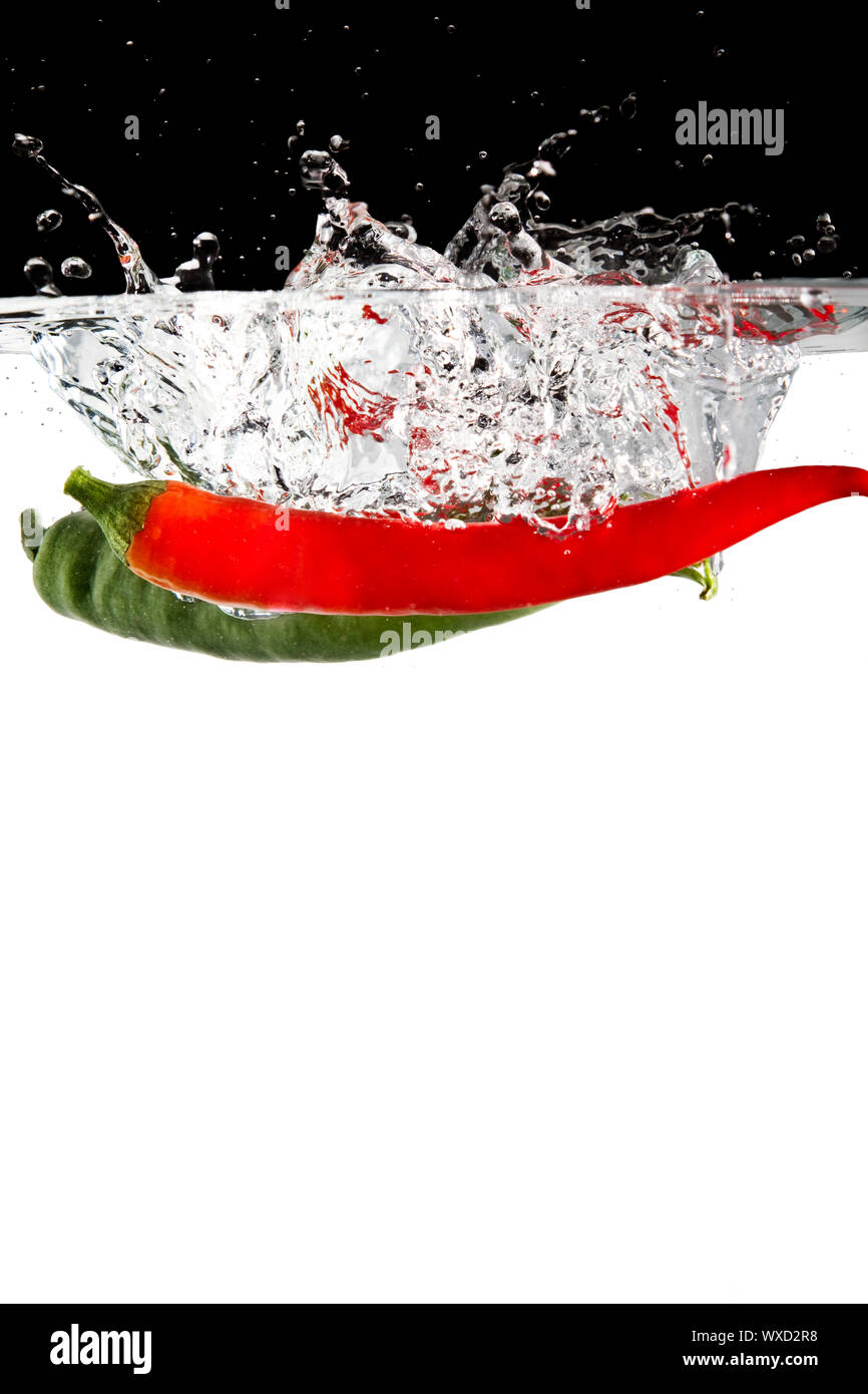 red and green chilli in water Stock Photo - Alamy