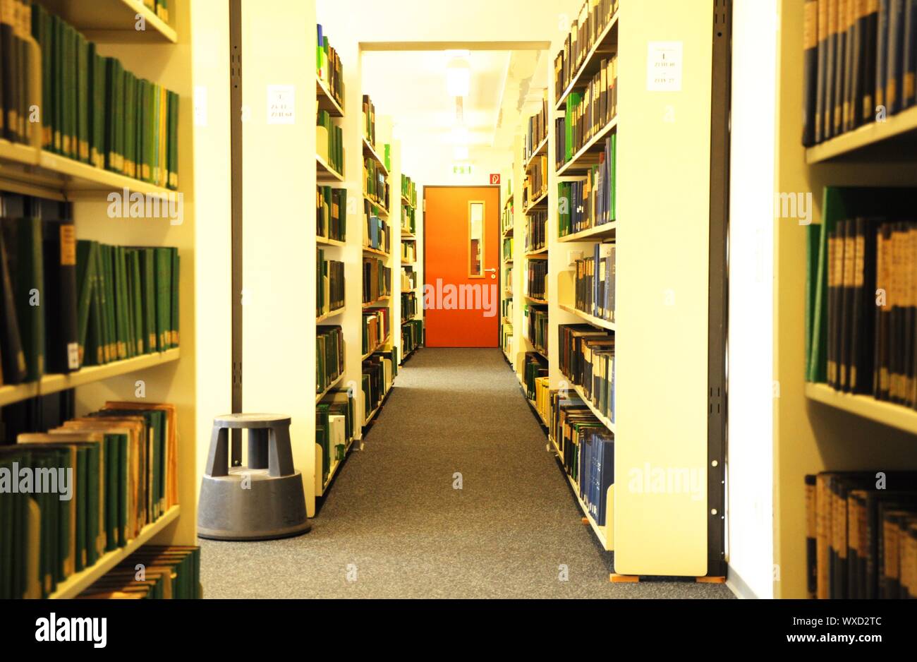 bookshelf of book shelf in a university library showing study concept ...
