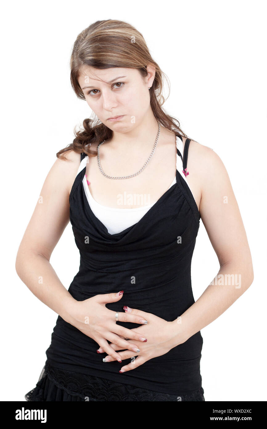 young brunette girl have bellyache - isolated on white background Stock ...