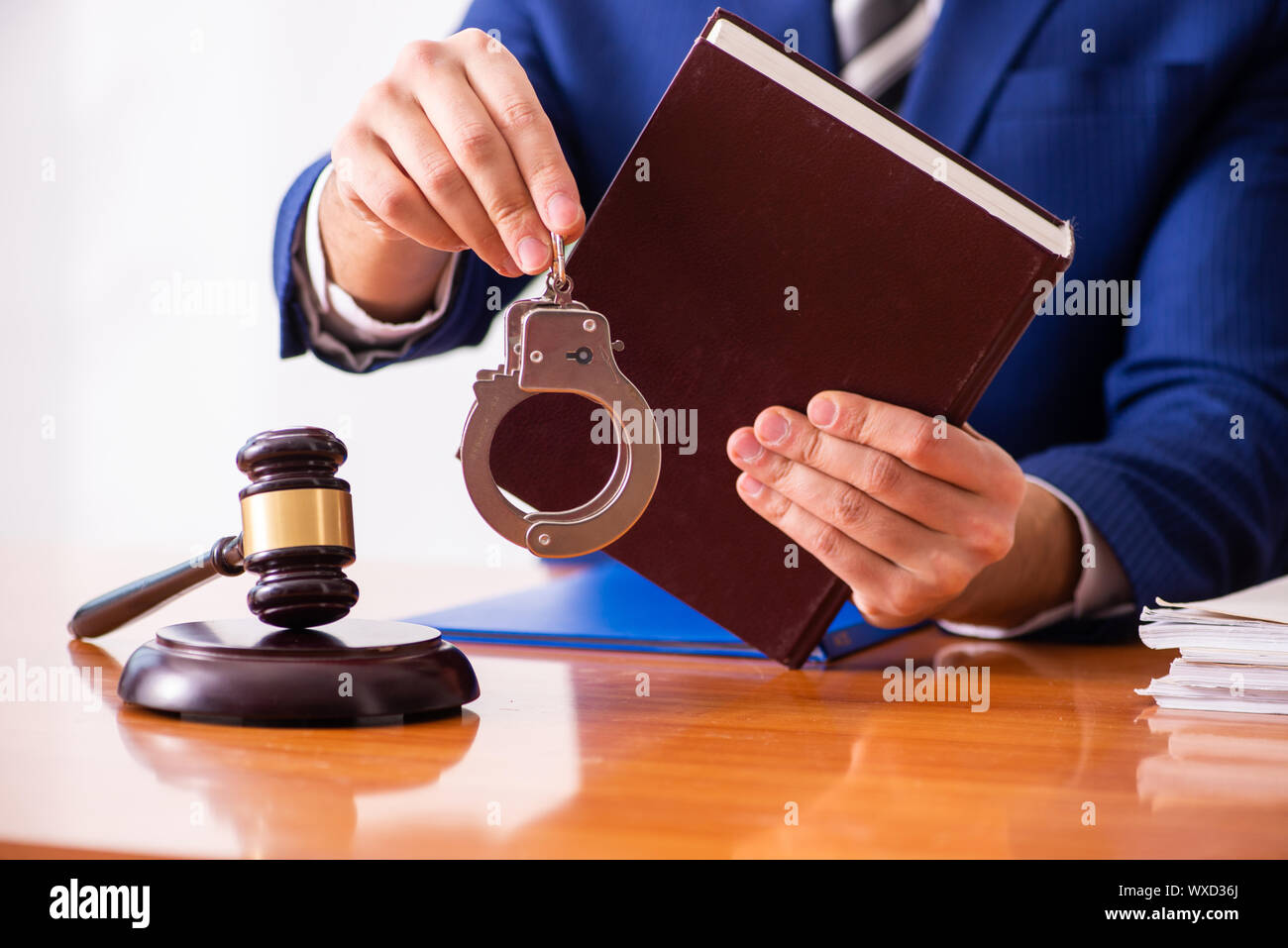 Man court hand cuffs hi-res stock photography and images - Alamy