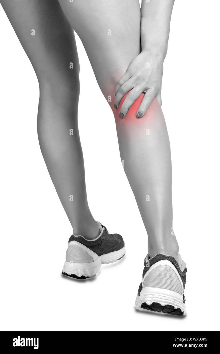 Female jogger with pain in her lower leg, black and white, isolated in ...