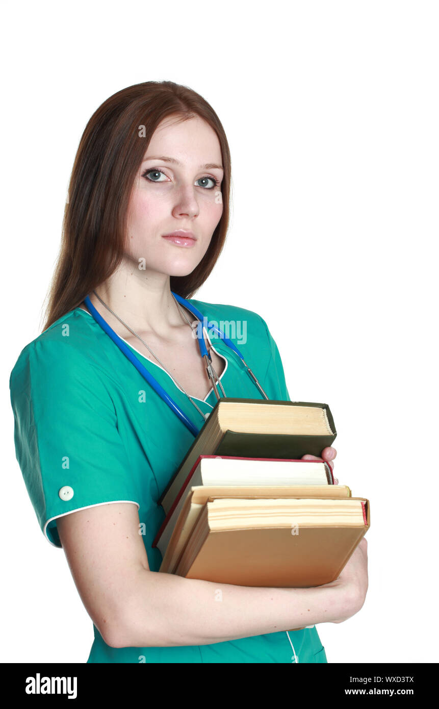 Portrait of female doctor with books Stock Photo - Alamy