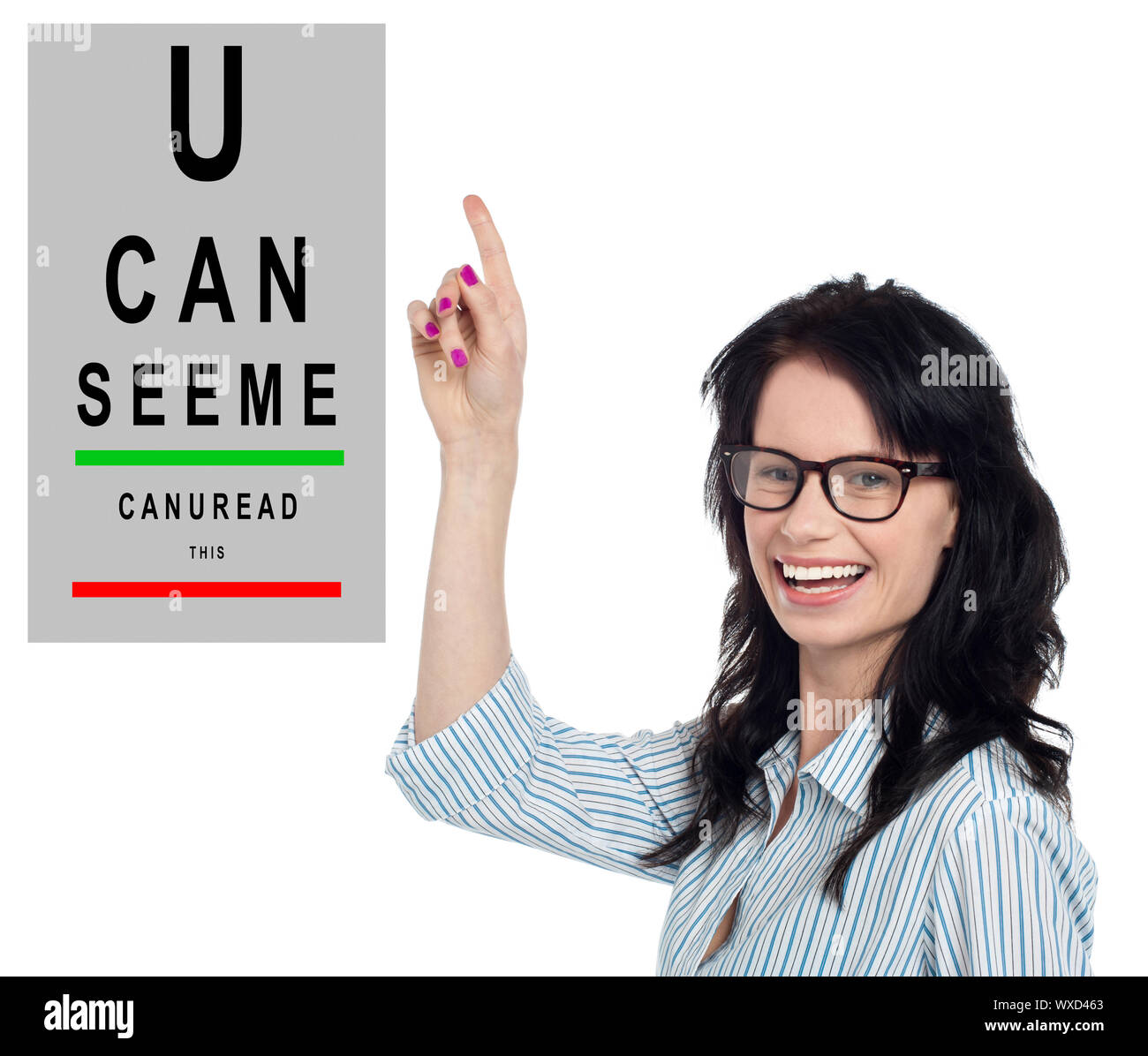 Female optician pointing finger towards eye testing display board Stock ...