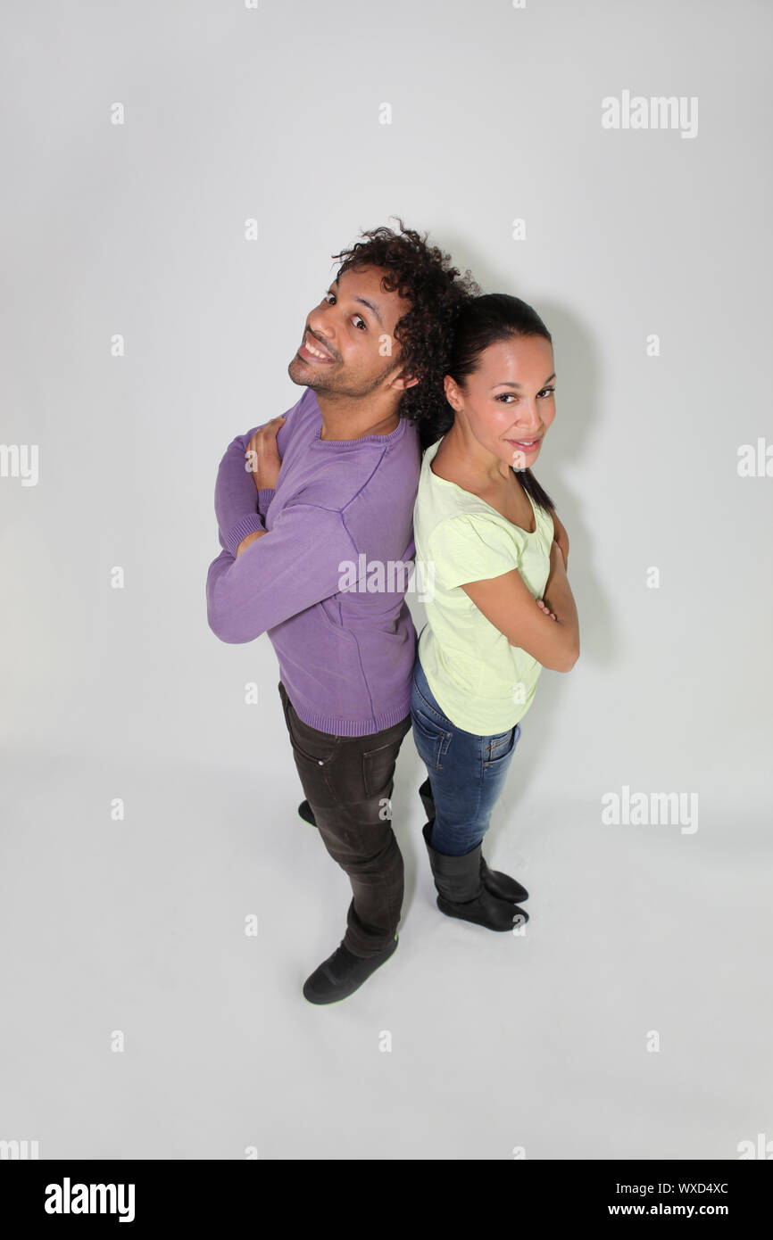 Couple back to back, top view Stock Photo - Alamy