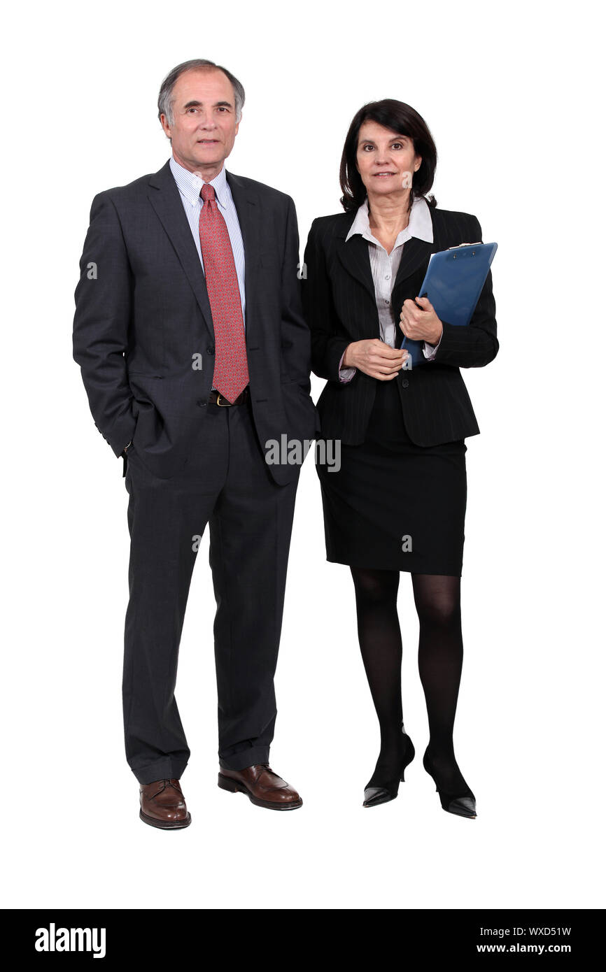 Senior business partners stood together Stock Photo - Alamy