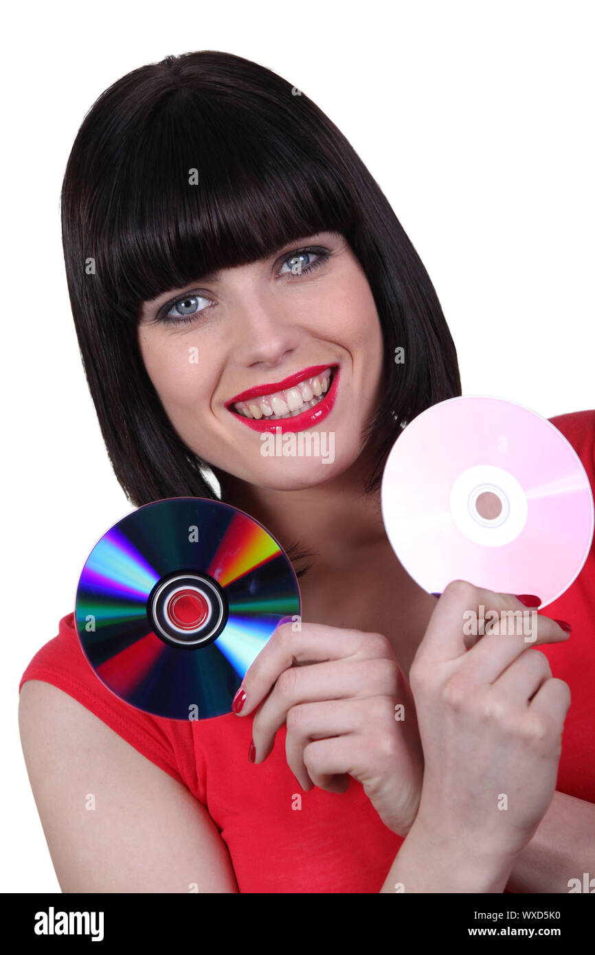 Woman with two CDs Stock Photo - Alamy
