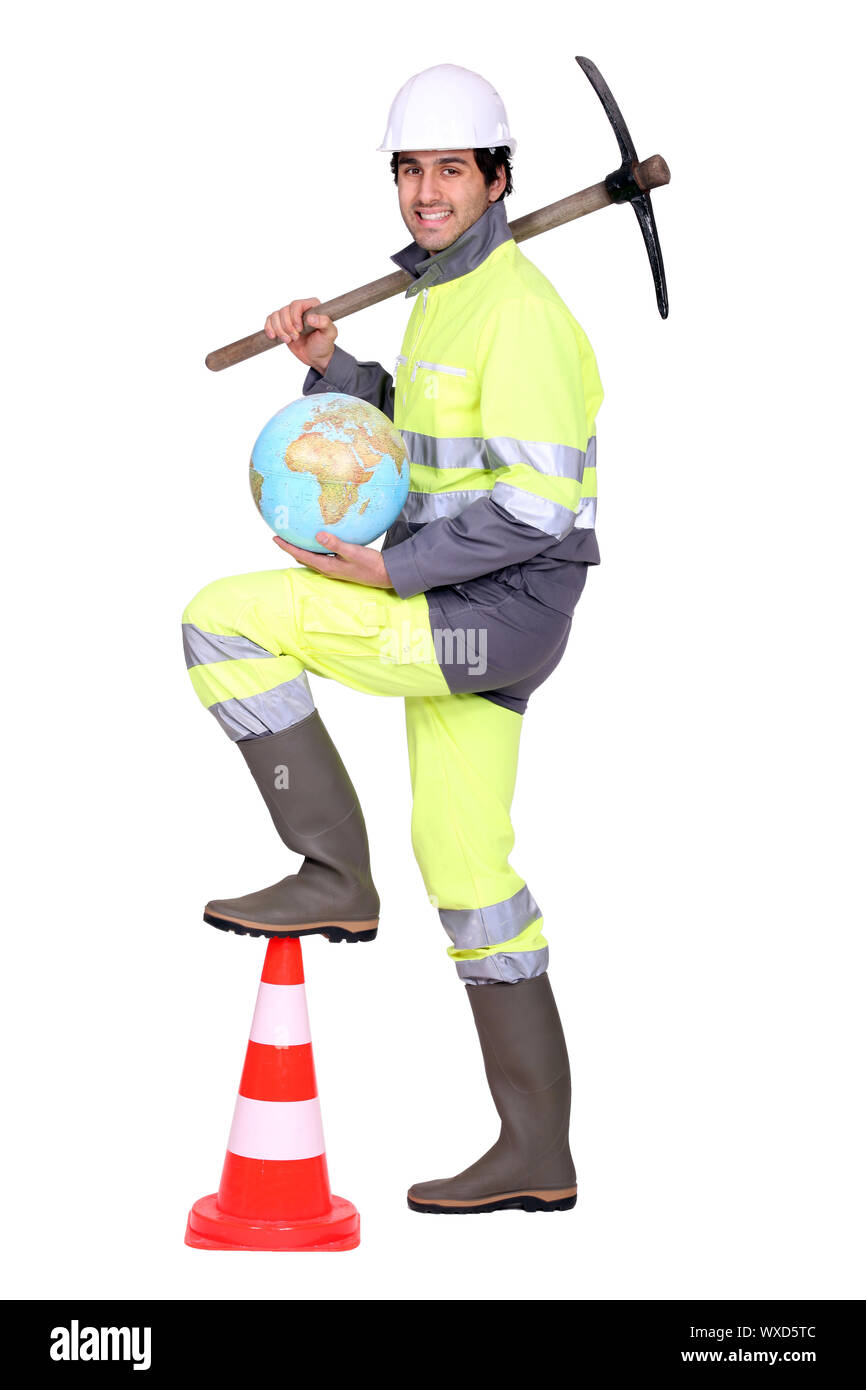Worker with pickaxe Stock Photo - Alamy