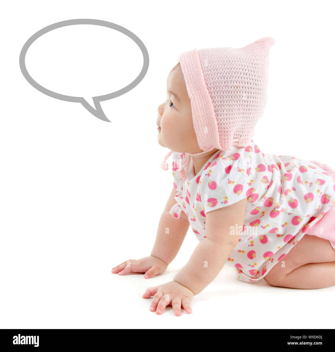 Six months old East Asian baby girl with announcement talk bubble ...