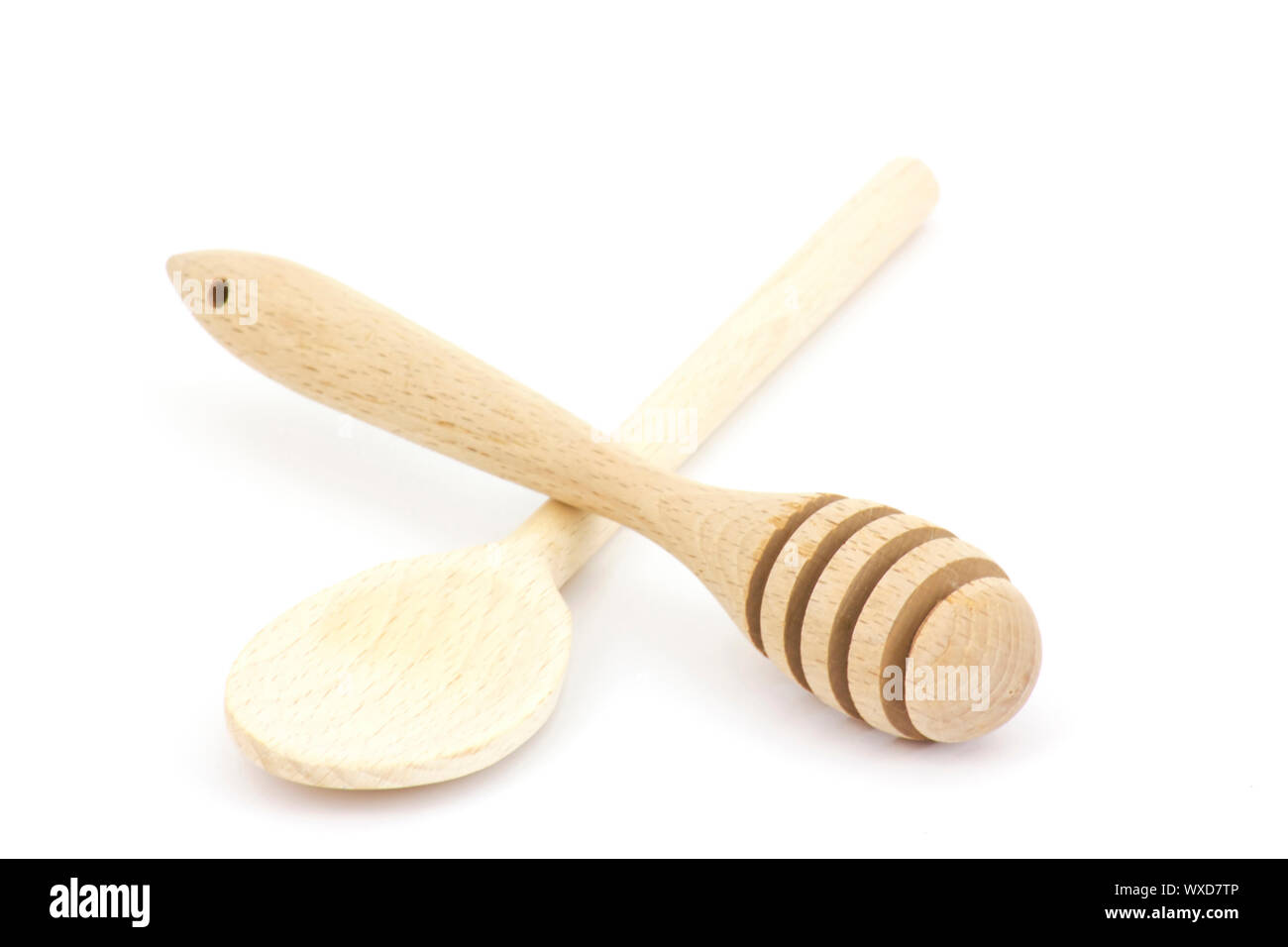 Wooden honey dipper and spoon isolated on white background Stock Photo ...