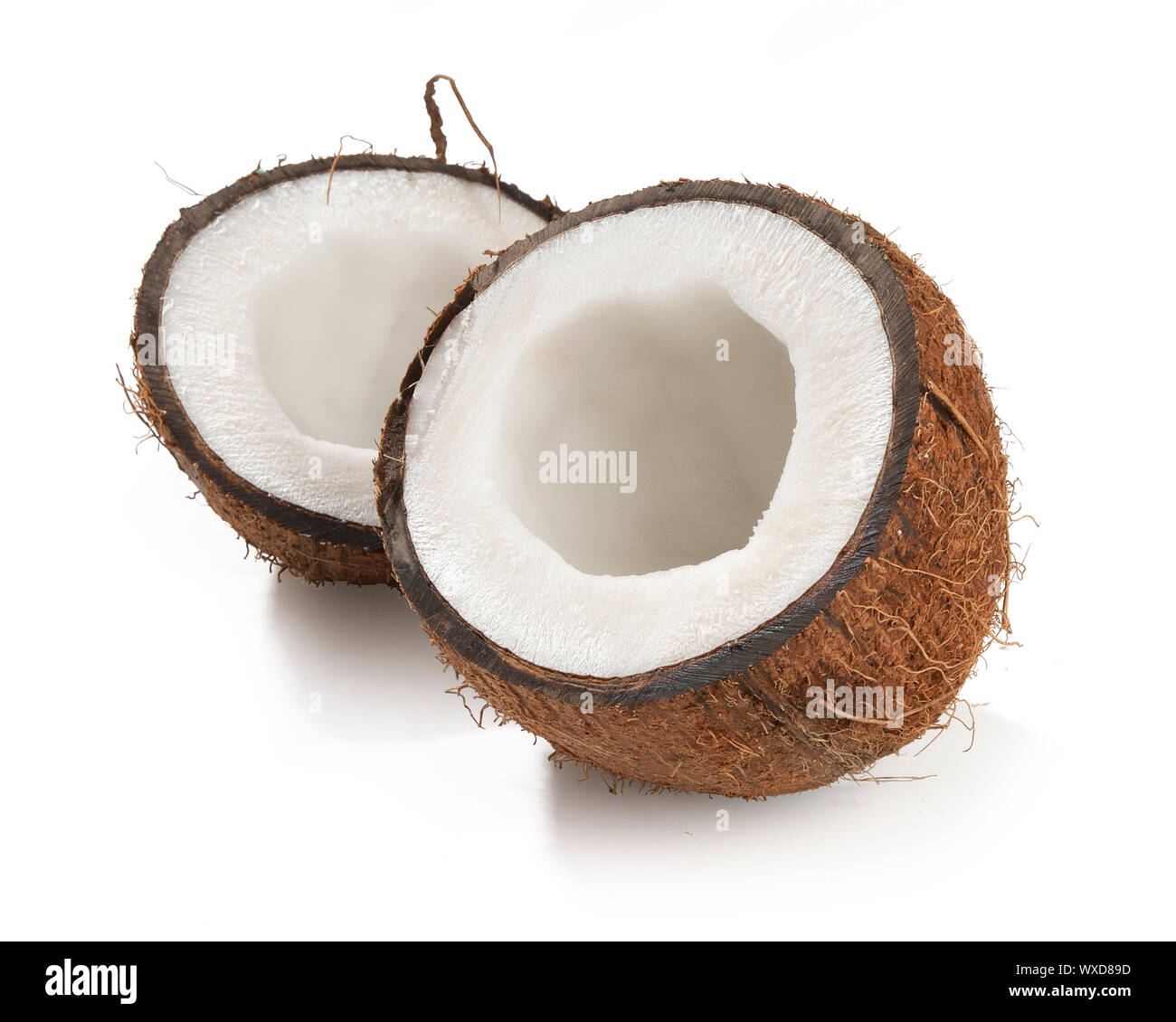 One opened coconut on the white background Stock Photo - Alamy