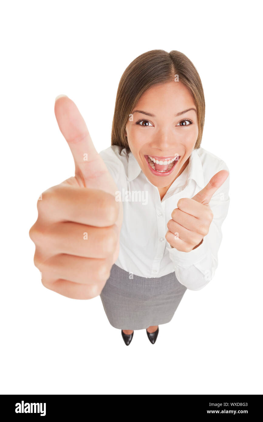 Happy excited woman giving thumbs up. Fun high angle view of laughing ...