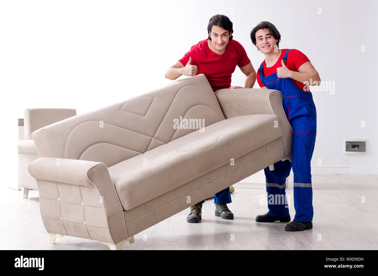 Movers moving sofa hi-res stock photography and images - Alamy