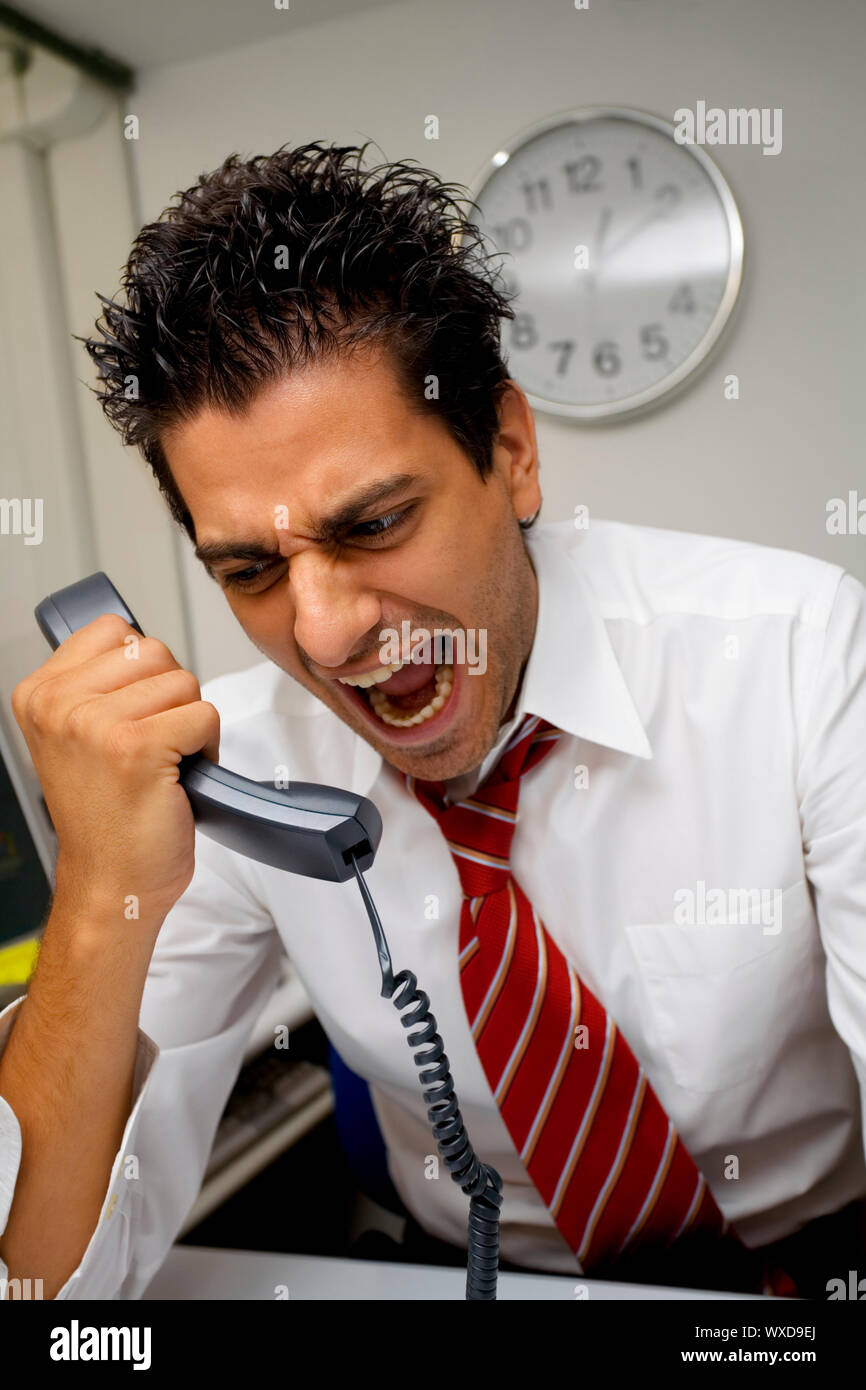 Angry boss speaking rude hi-res stock photography and images - Alamy
