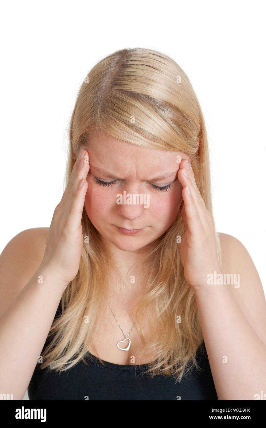 young blonde woman with splitting headache - isolated on white ...