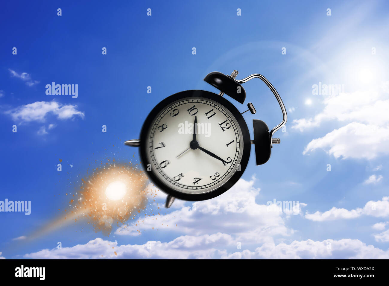 Time management concept, fly alarm clock on sky background Stock Photo ...
