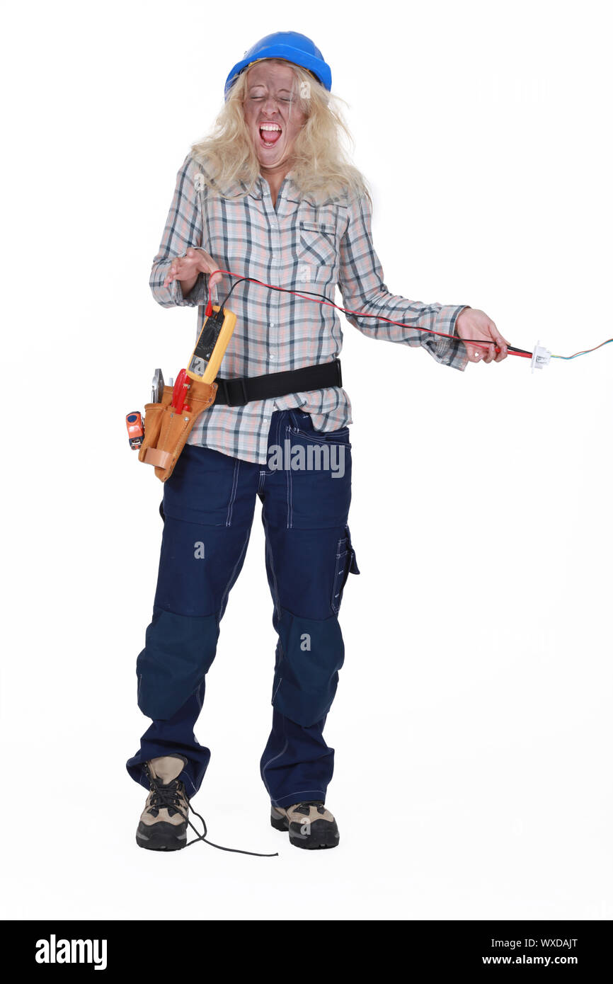 Woman receiving electrical shock Stock Photo - Alamy