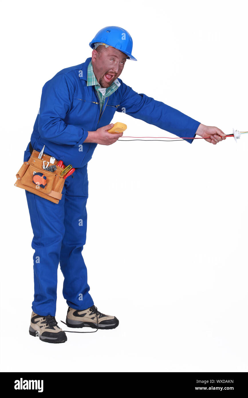 A shocked electrician Stock Photo - Alamy
