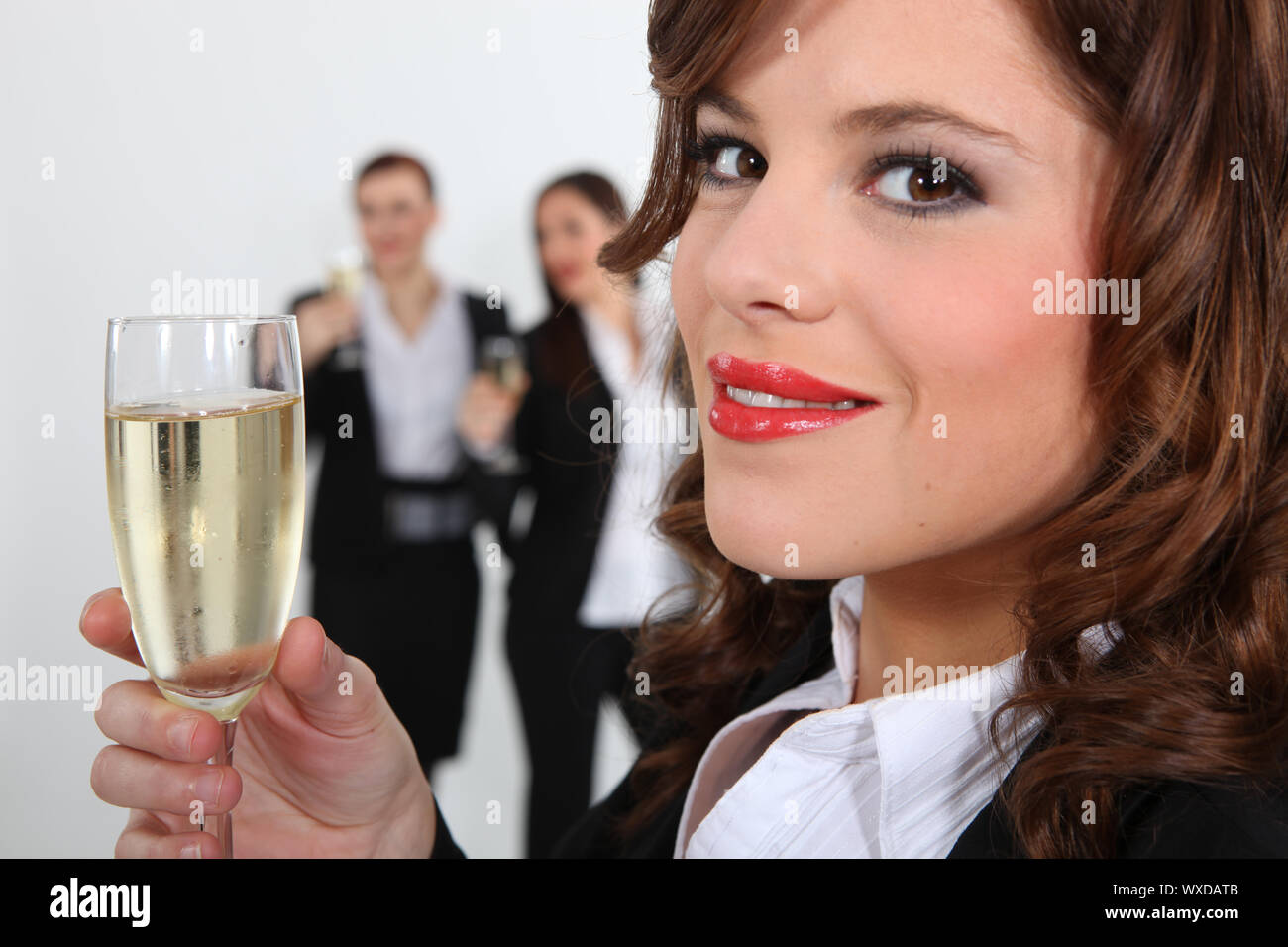 Business team drinking champagne Stock Photo - Alamy