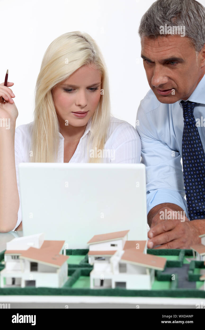 real estate businessman and his secretary working Stock Photo - Alamy